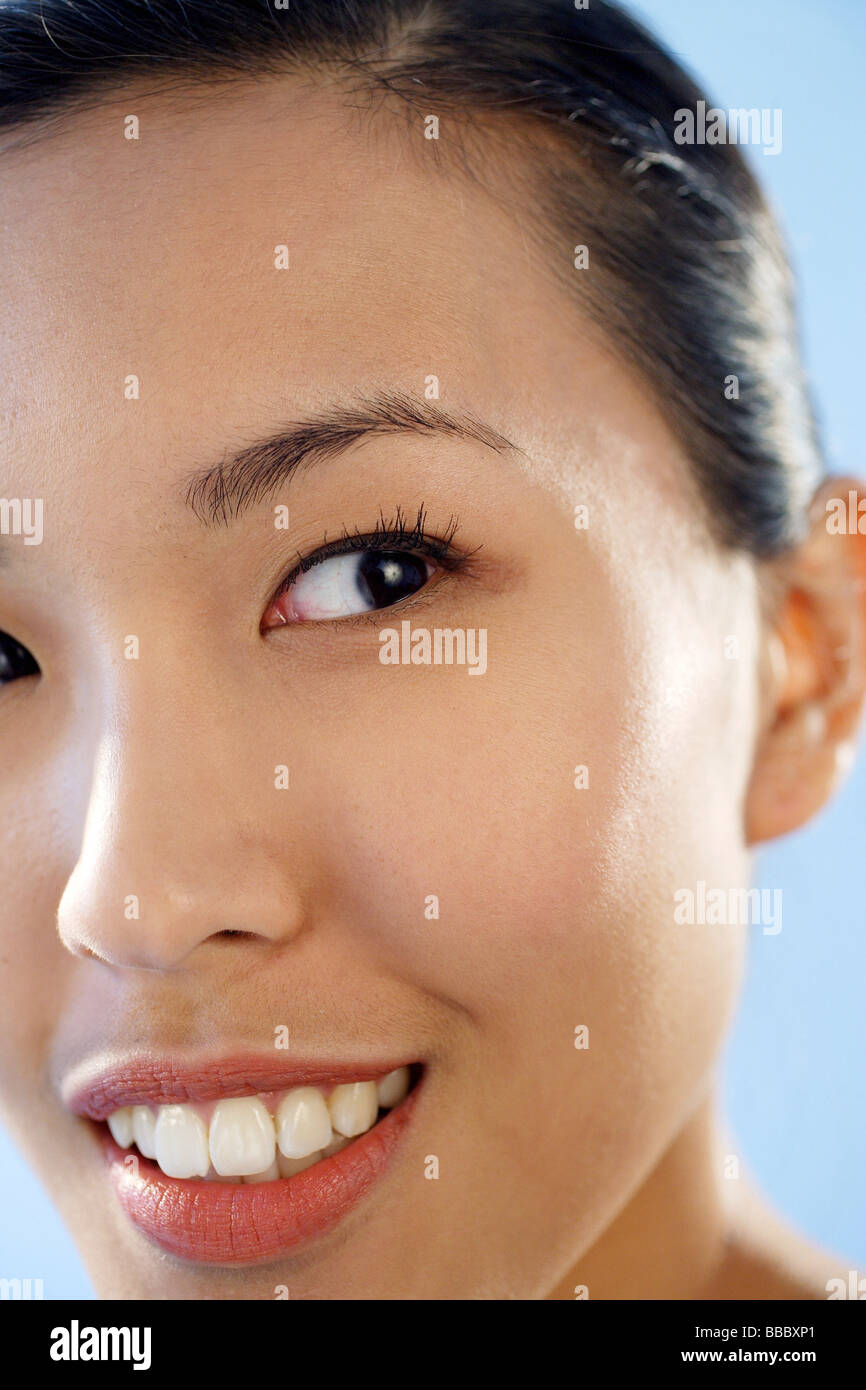 Close up of woman's face, looking away Stock Photo - Alamy