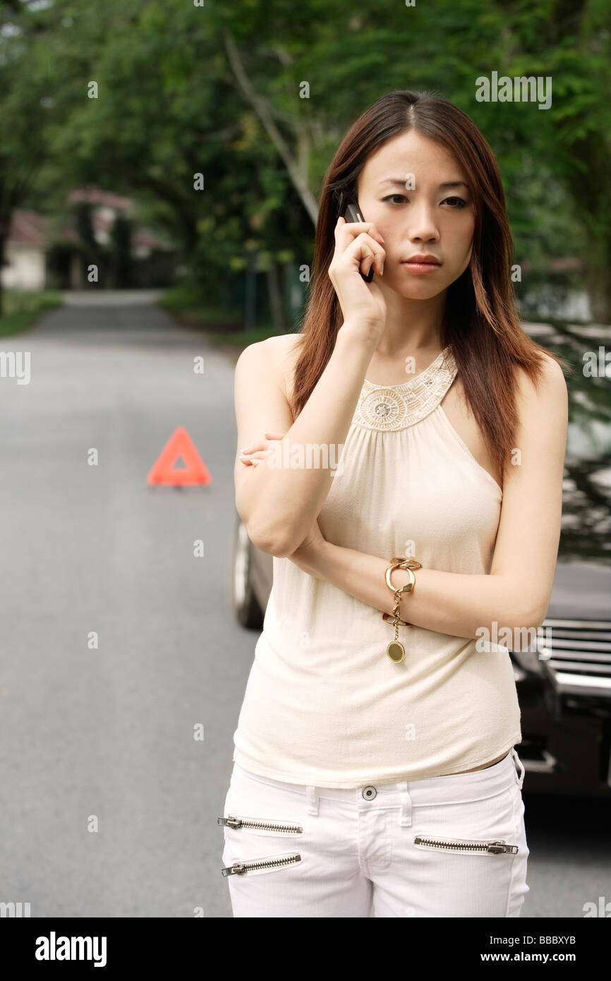 Angry woman on phone, broken car Stock Photo - Alamy