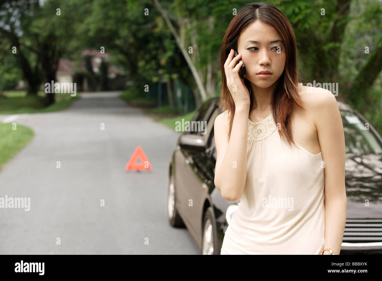 Angry woman on phone, broken car Stock Photo - Alamy