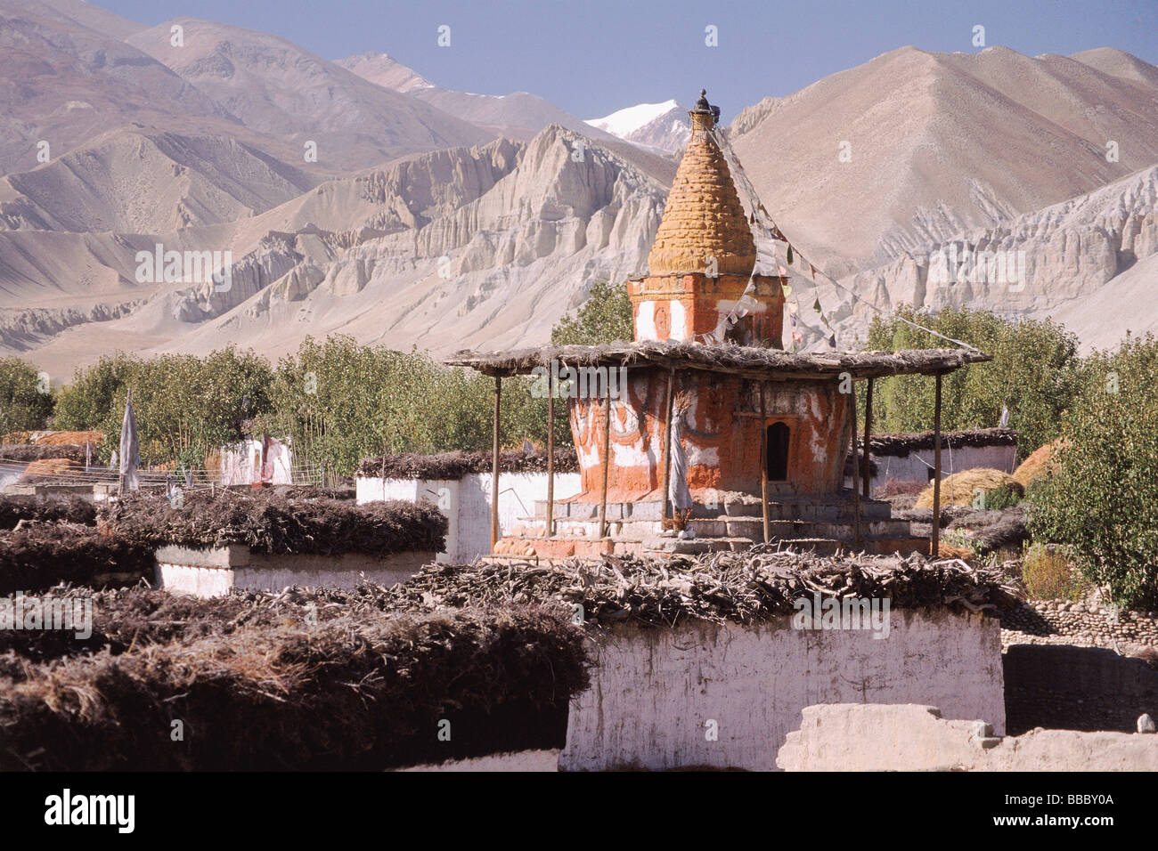 Nepal, Mustang, Ancient chortens, mountains in background Stock Photo ...