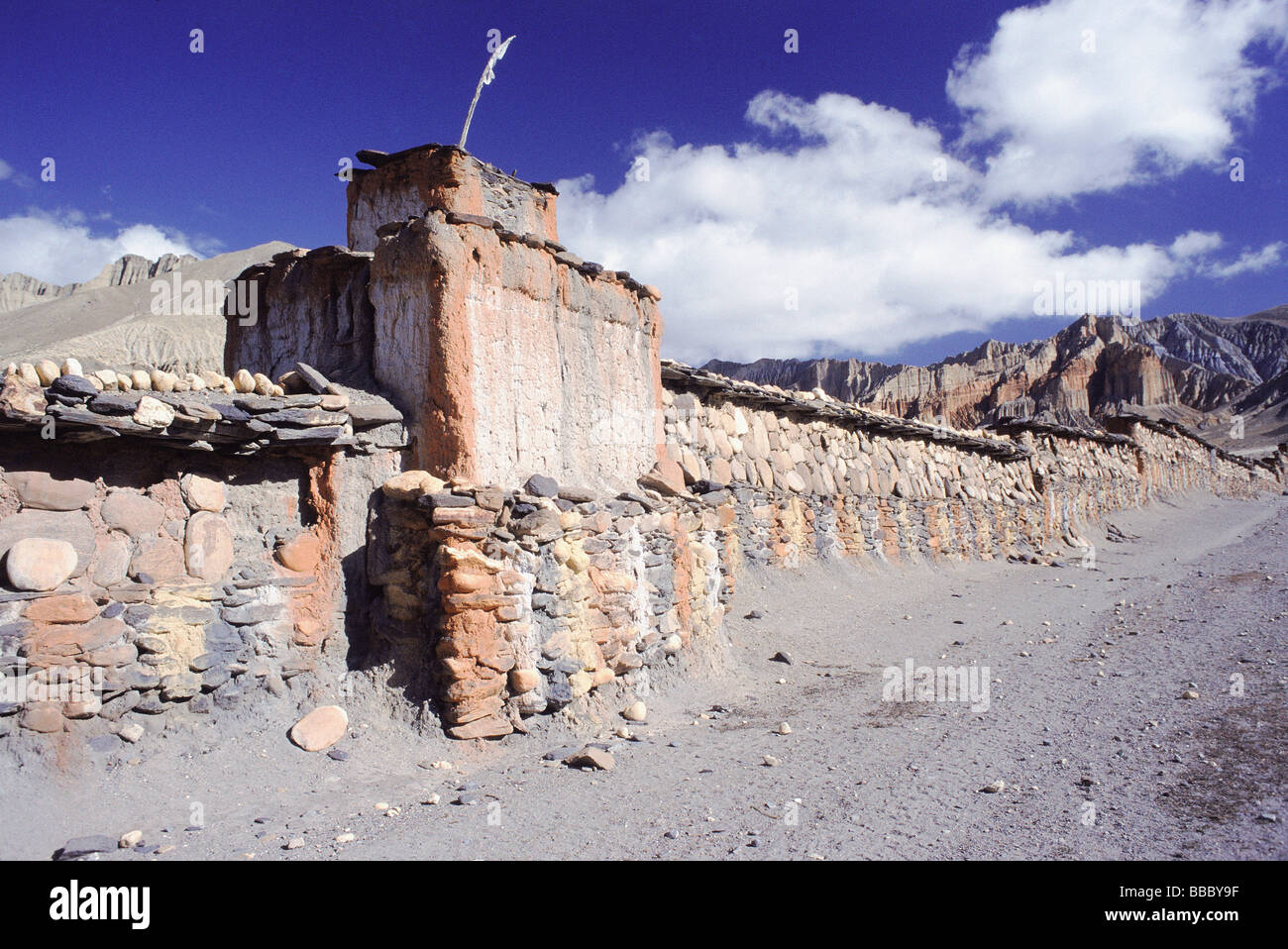 Nepal, Ghame, Mani wall of carved mani stones with the Tibetan Buddhist ...