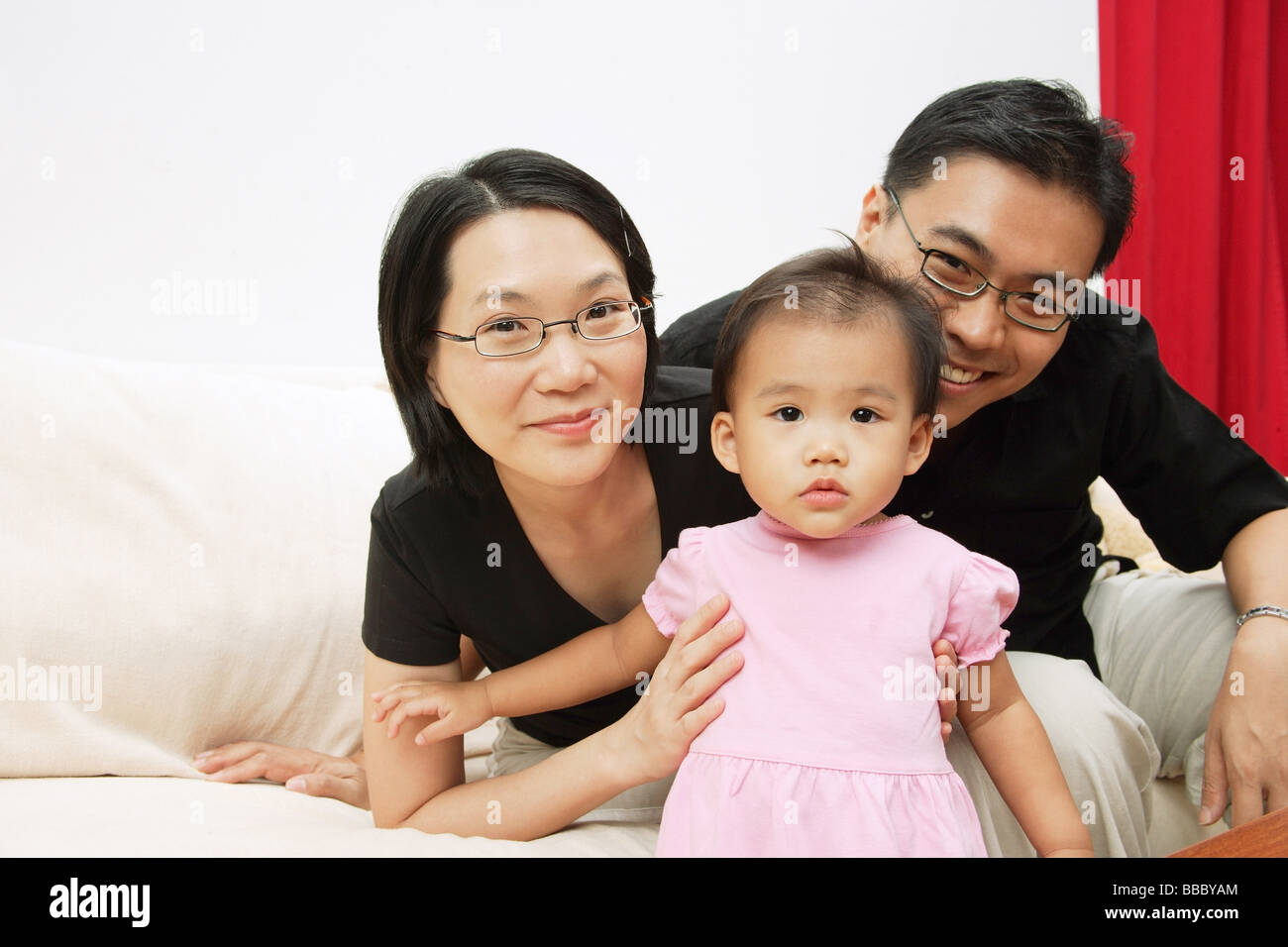 Family with one child, portrait Stock Photo - Alamy