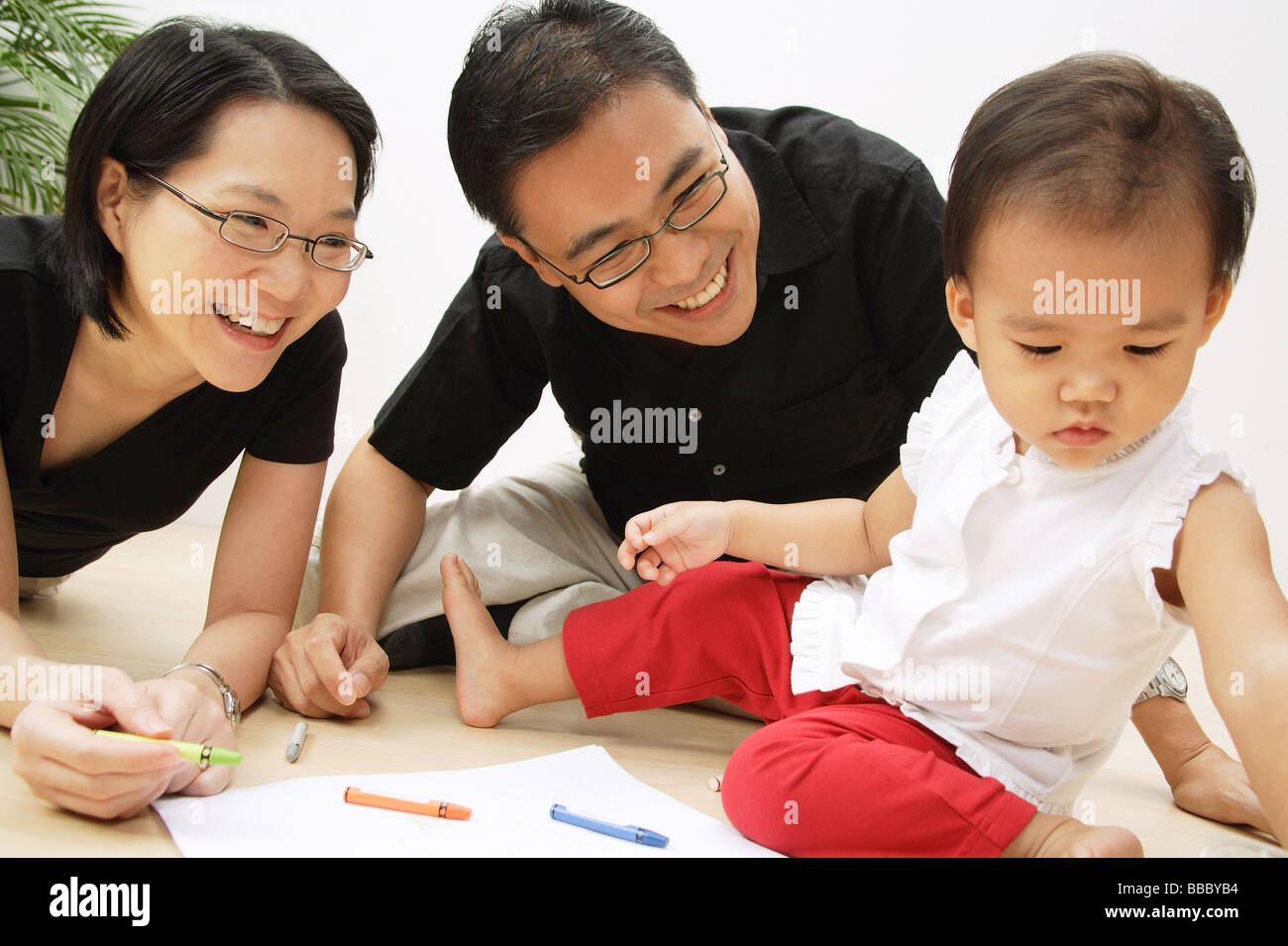 Family with one child, portrait Stock Photo - Alamy