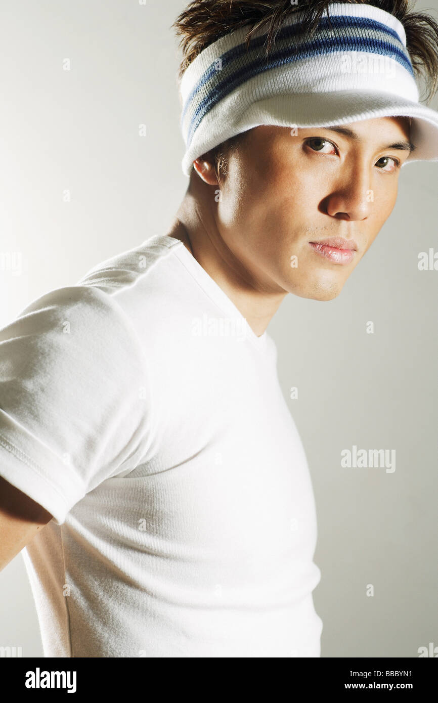 Young man looking at camera, portrait Stock Photo - Alamy