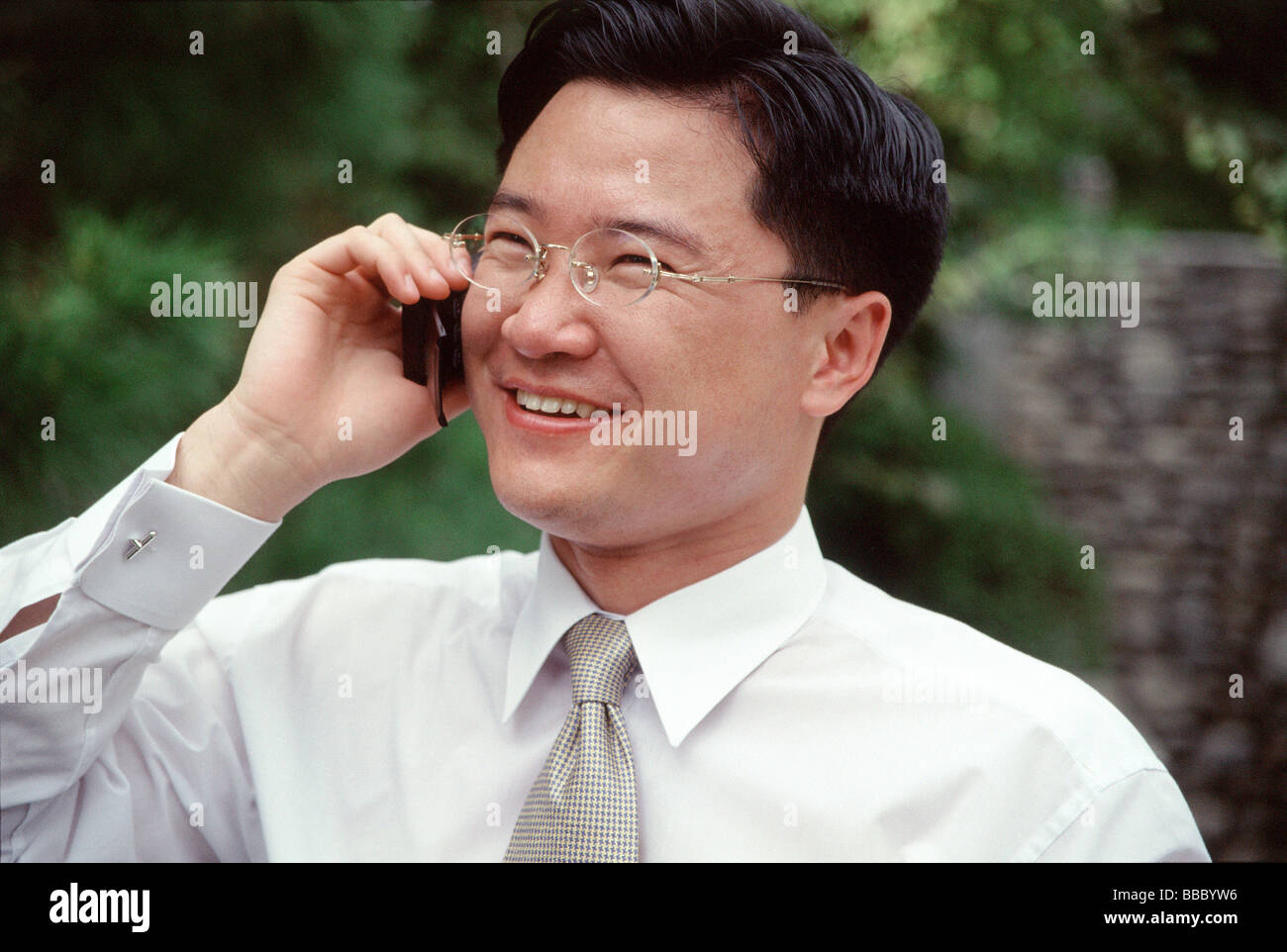 Man using mobile phone, head shot Stock Photo - Alamy