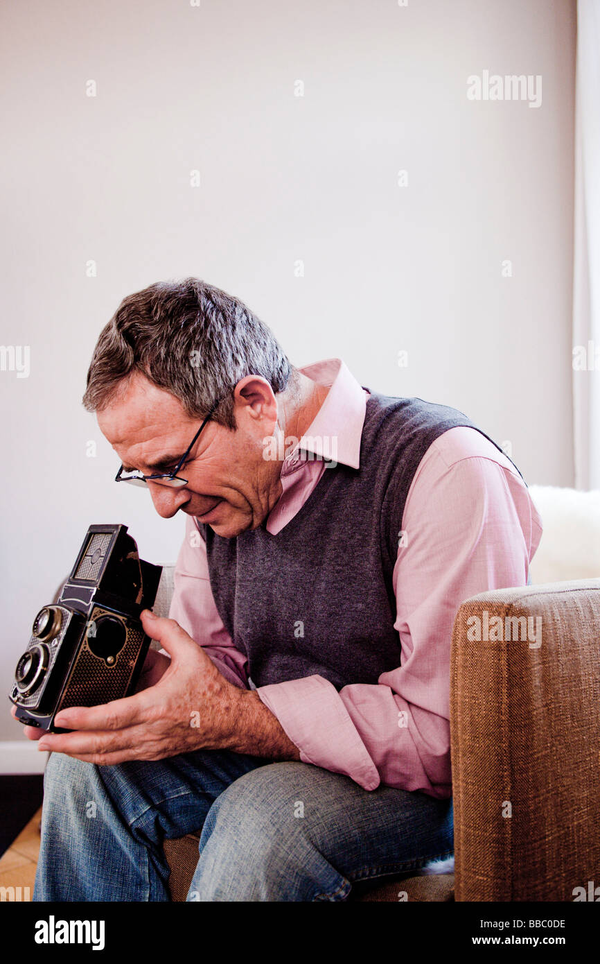 man playing with camera Stock Photo - Alamy