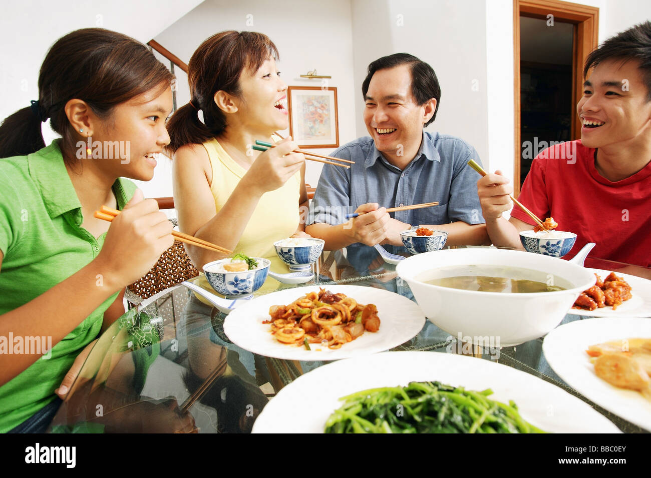 Family having dinner at home Stock Photo - Alamy