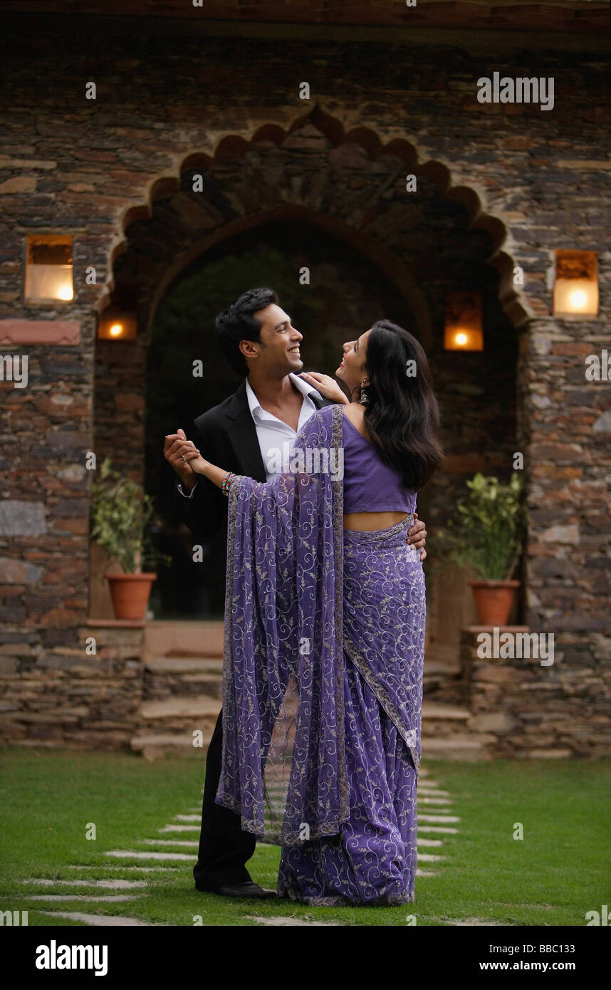 young couple dancing in garden Stock Photo - Alamy