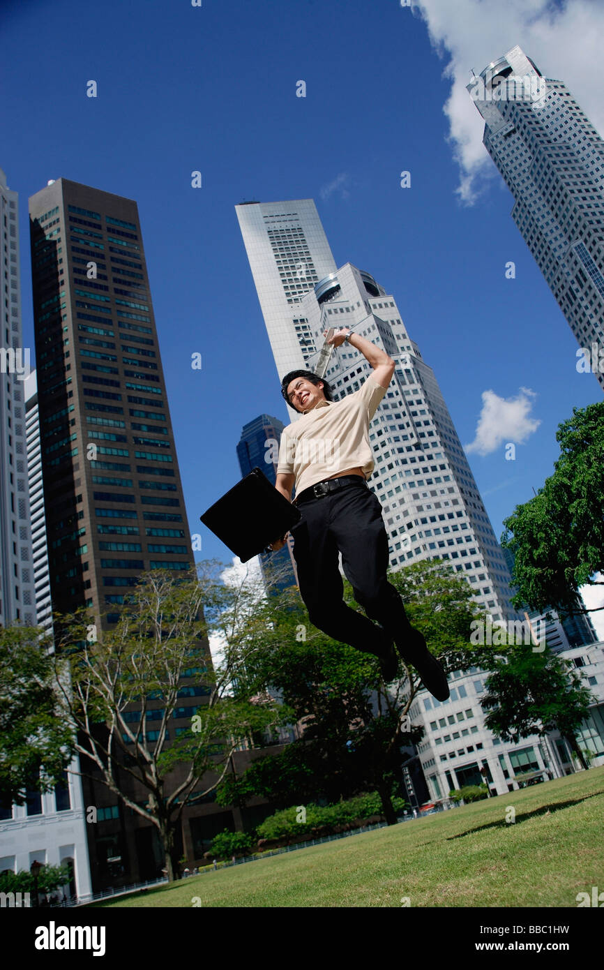 Man suit jumping laptop hi-res stock photography and images - Alamy