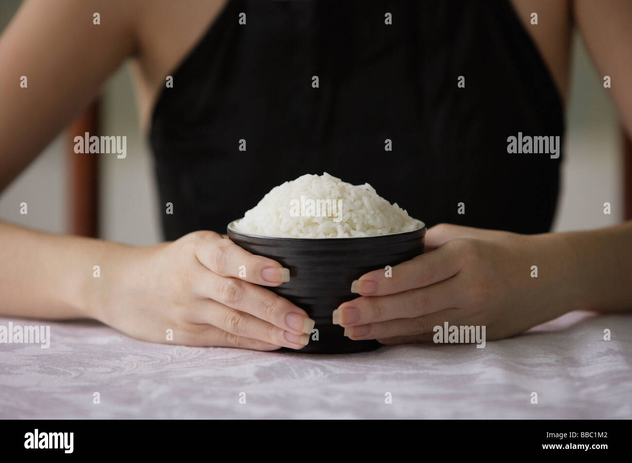 Hands rice hi-res stock photography and images - Alamy