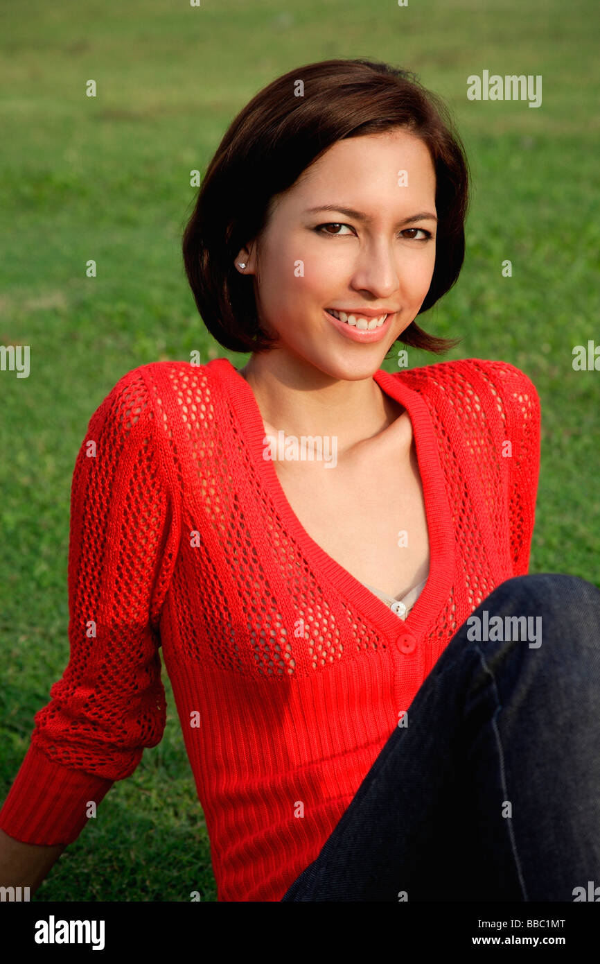 Young woman relaxes on brown hi-res stock photography and images - Alamy