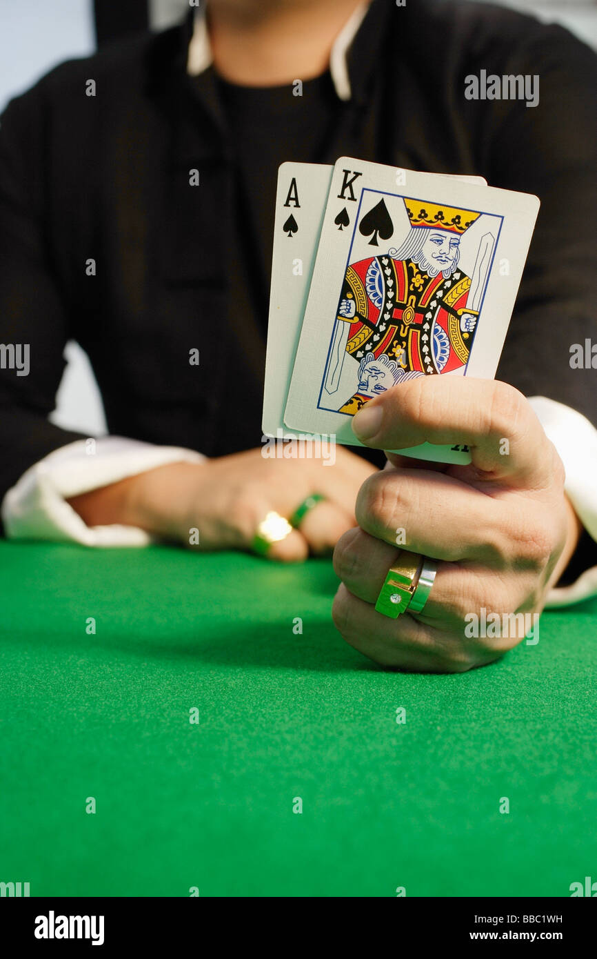 A man playing cards Stock Photo - Alamy