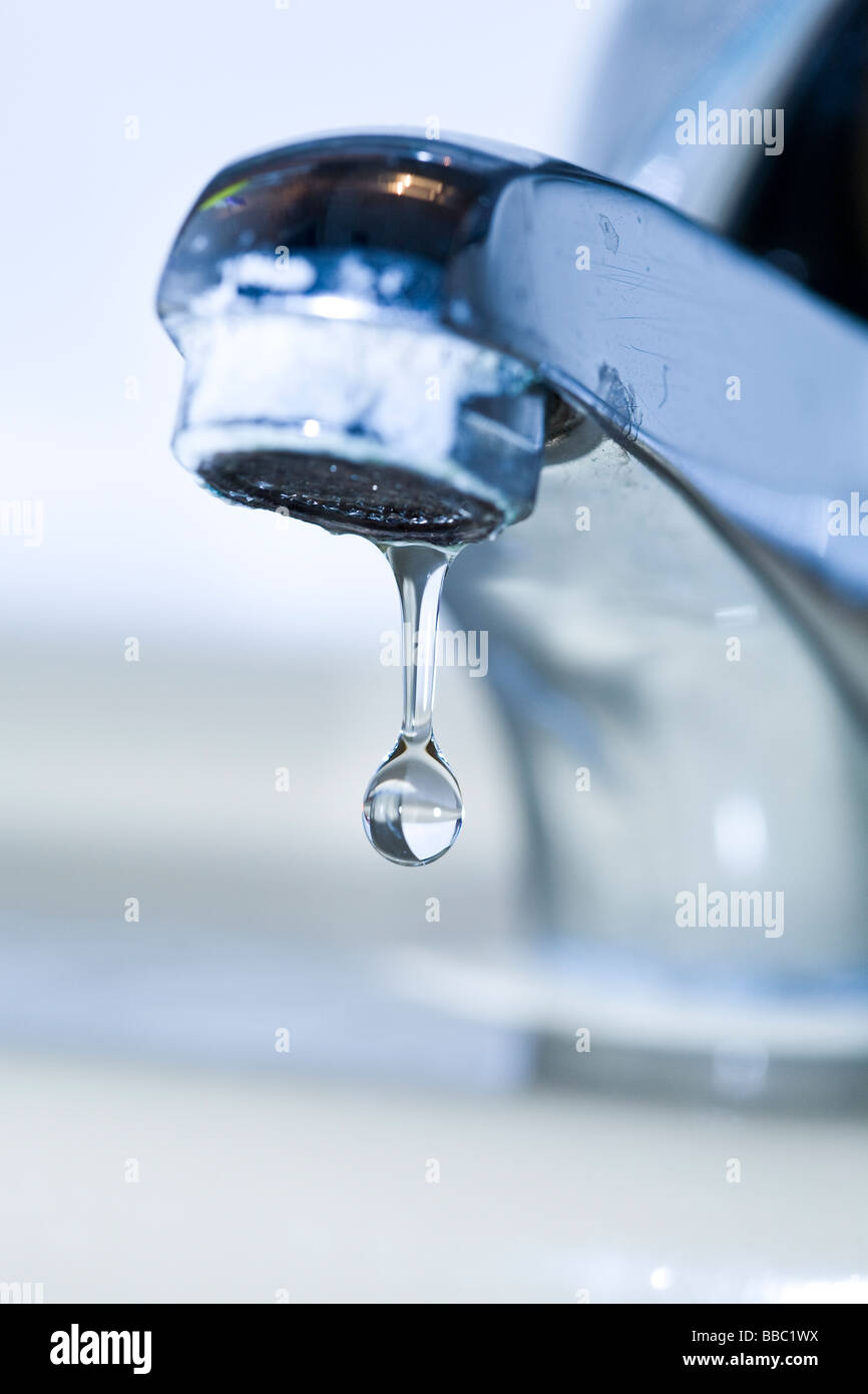 water drop in a tap Stock Photo - Alamy
