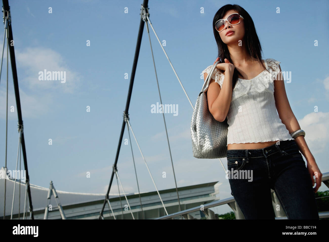 A woman on a bridge Stock Photo - Alamy