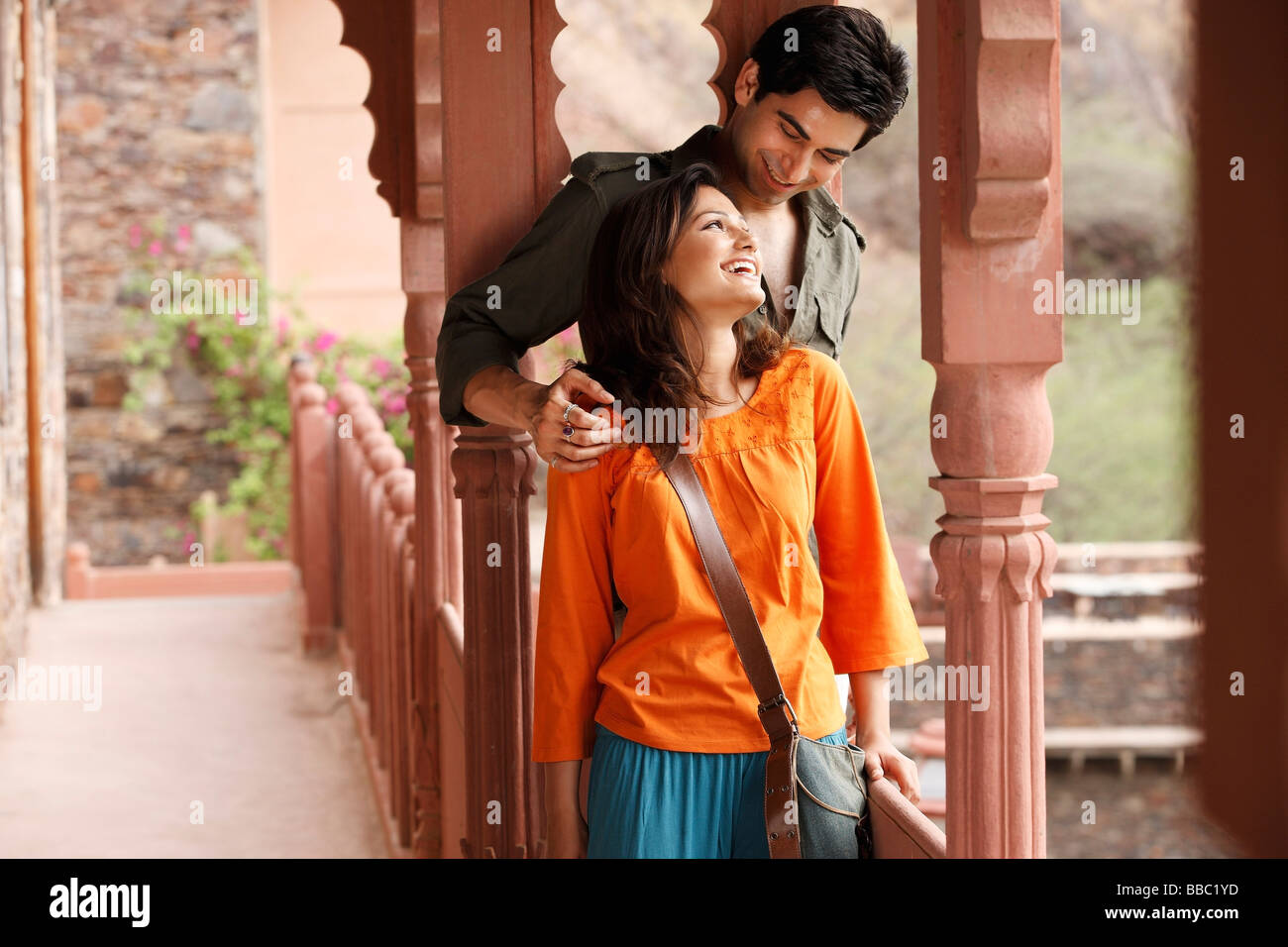 Couple building balcony hi-res stock photography and images - Alamy