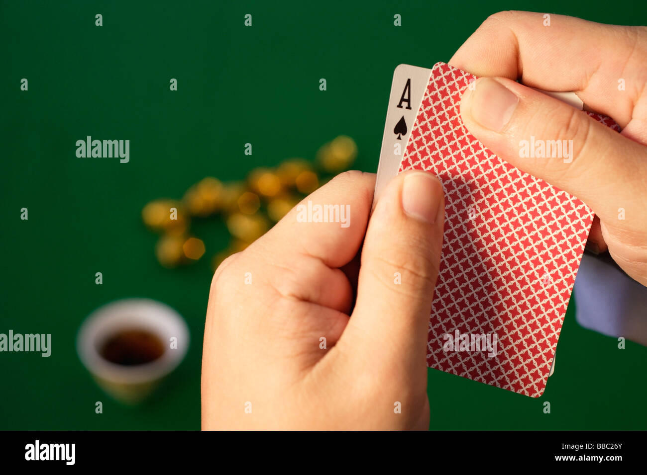 A man playing cards Stock Photo - Alamy