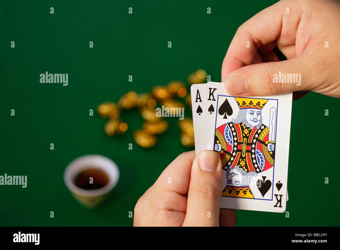 A man playing cards Stock Photo - Alamy