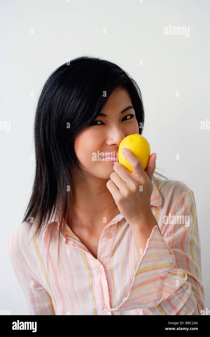 Black woman smell lemon hi-res stock photography and images - Alamy