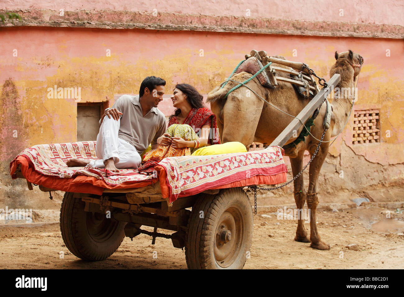 couple on camel cart Stock Photo - Alamy