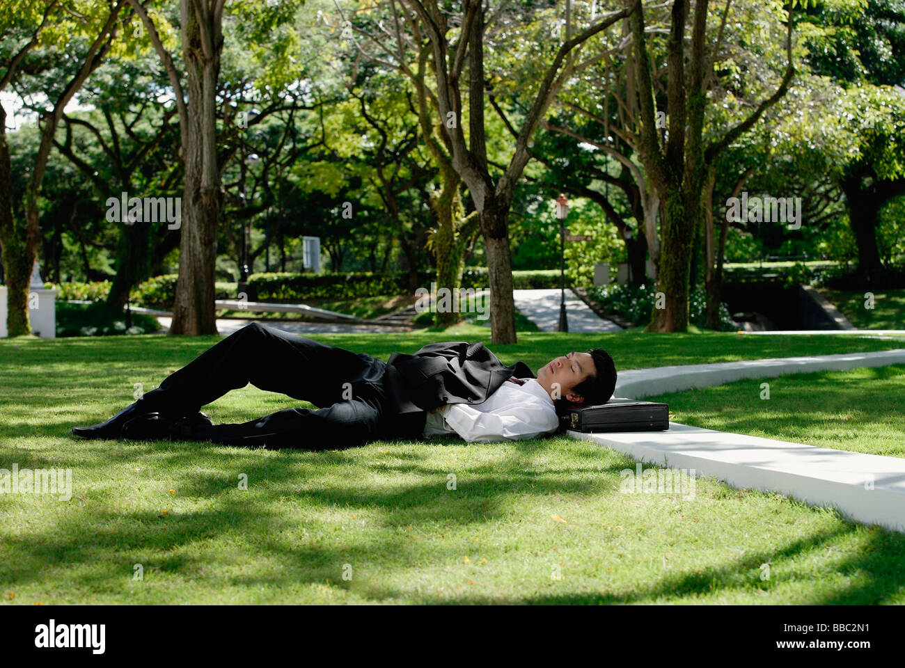 Sleeping in park suit hi-res stock photography and images - Alamy