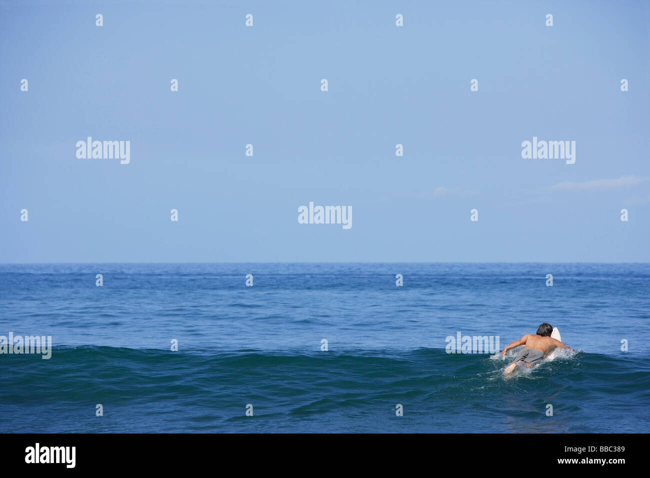 Man with surf hi-res stock photography and images - Alamy