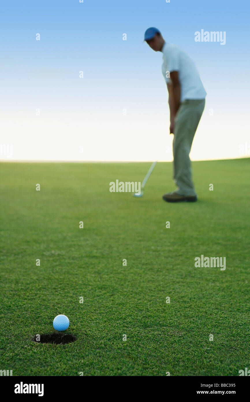 man playing golf Stock Photo - Alamy