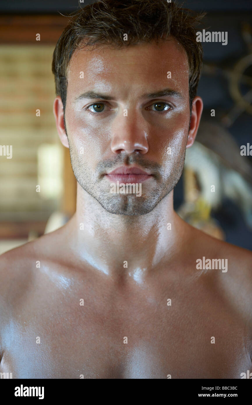 Portrait of sweaty young man Stock Photo - Alamy