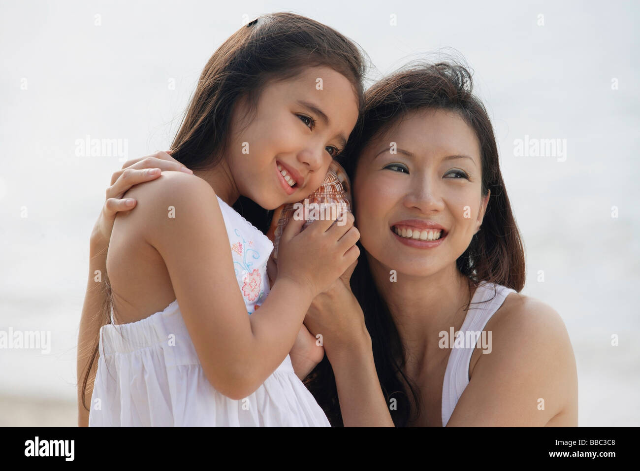 Chinese family standing on beach hi-res stock photography and images ...