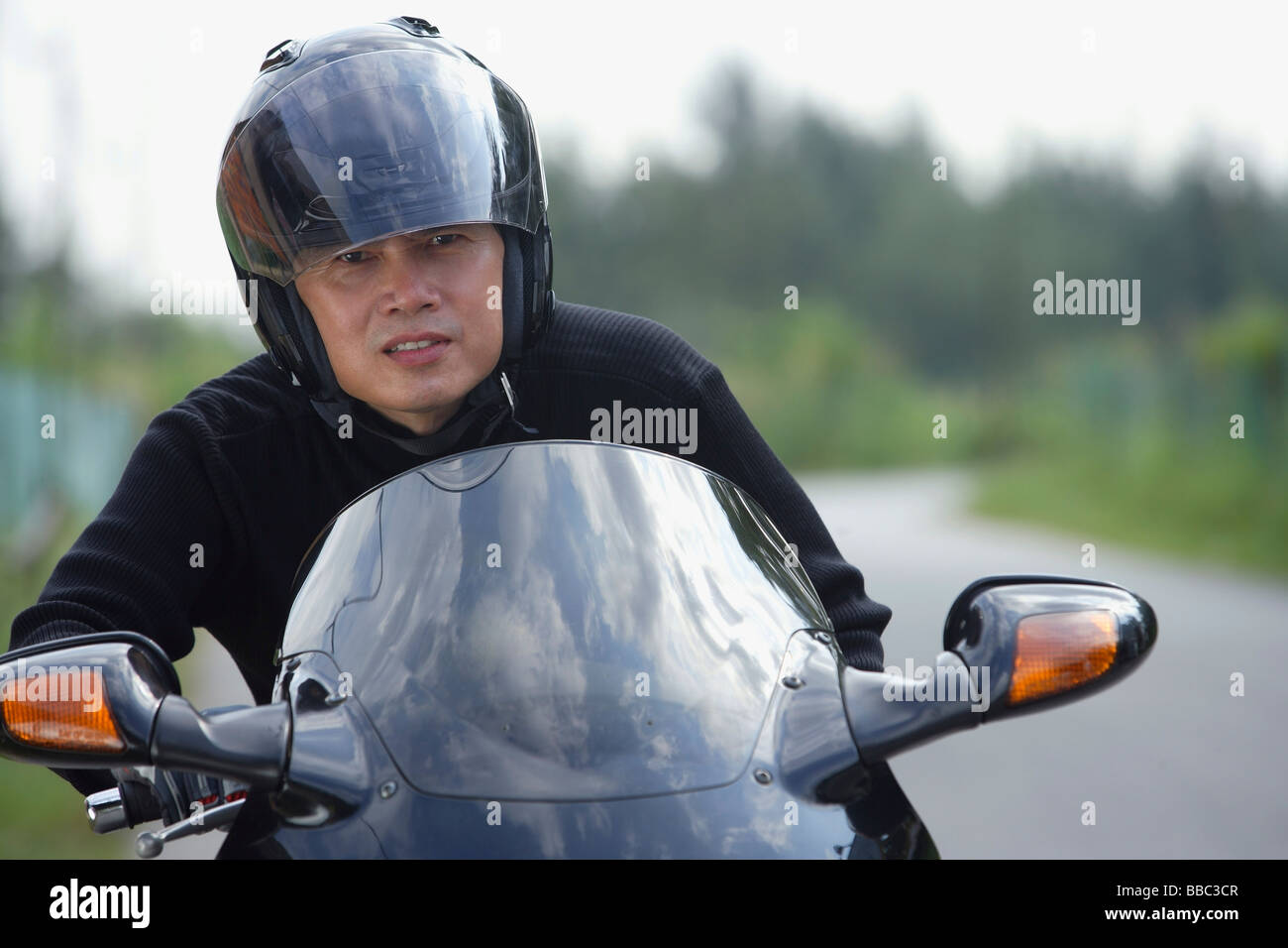 Riding motorcycle helmet hi-res stock photography and images - Alamy