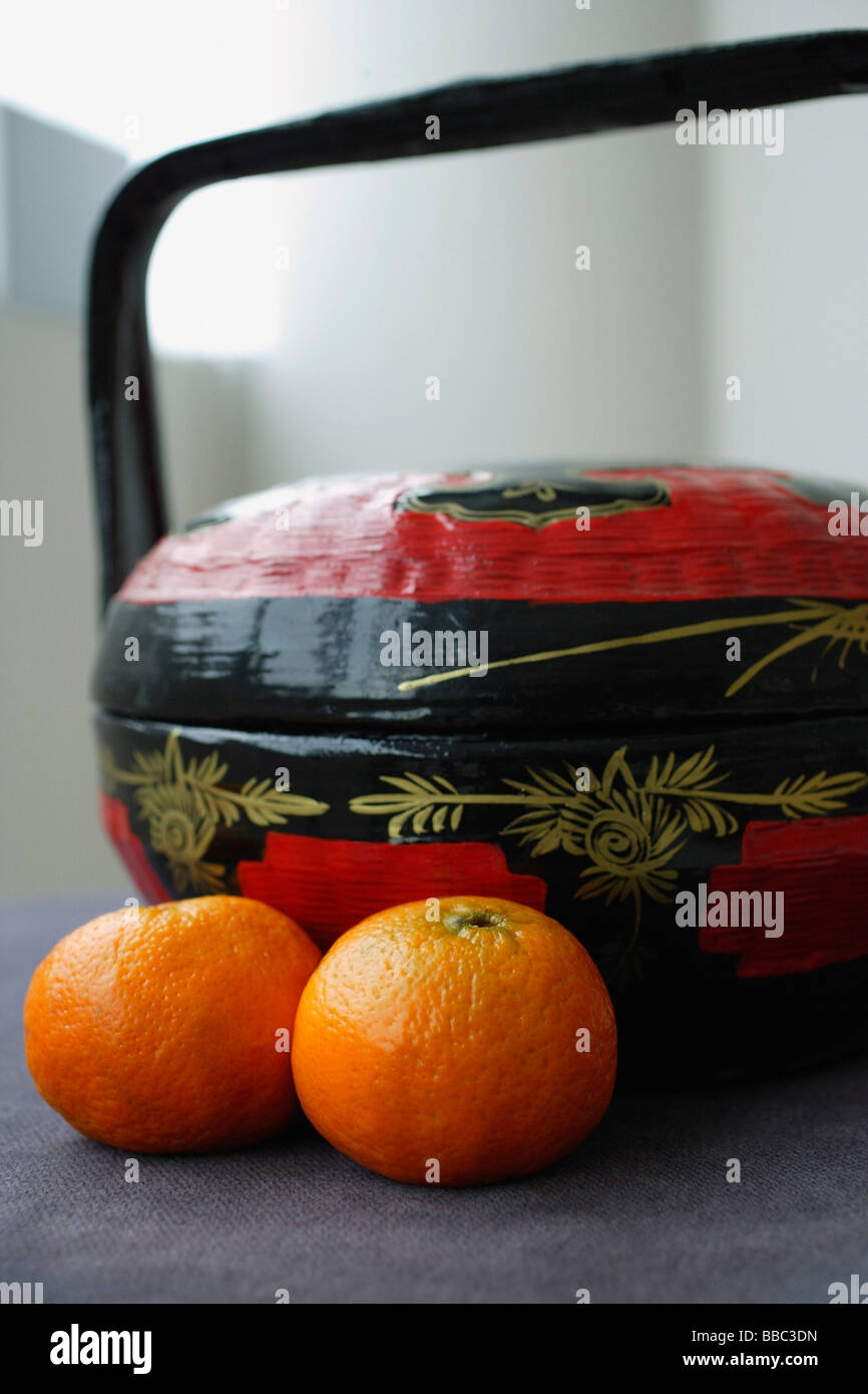 Chinese wedding basket with Mandarin Oranges Stock Photo - Alamy