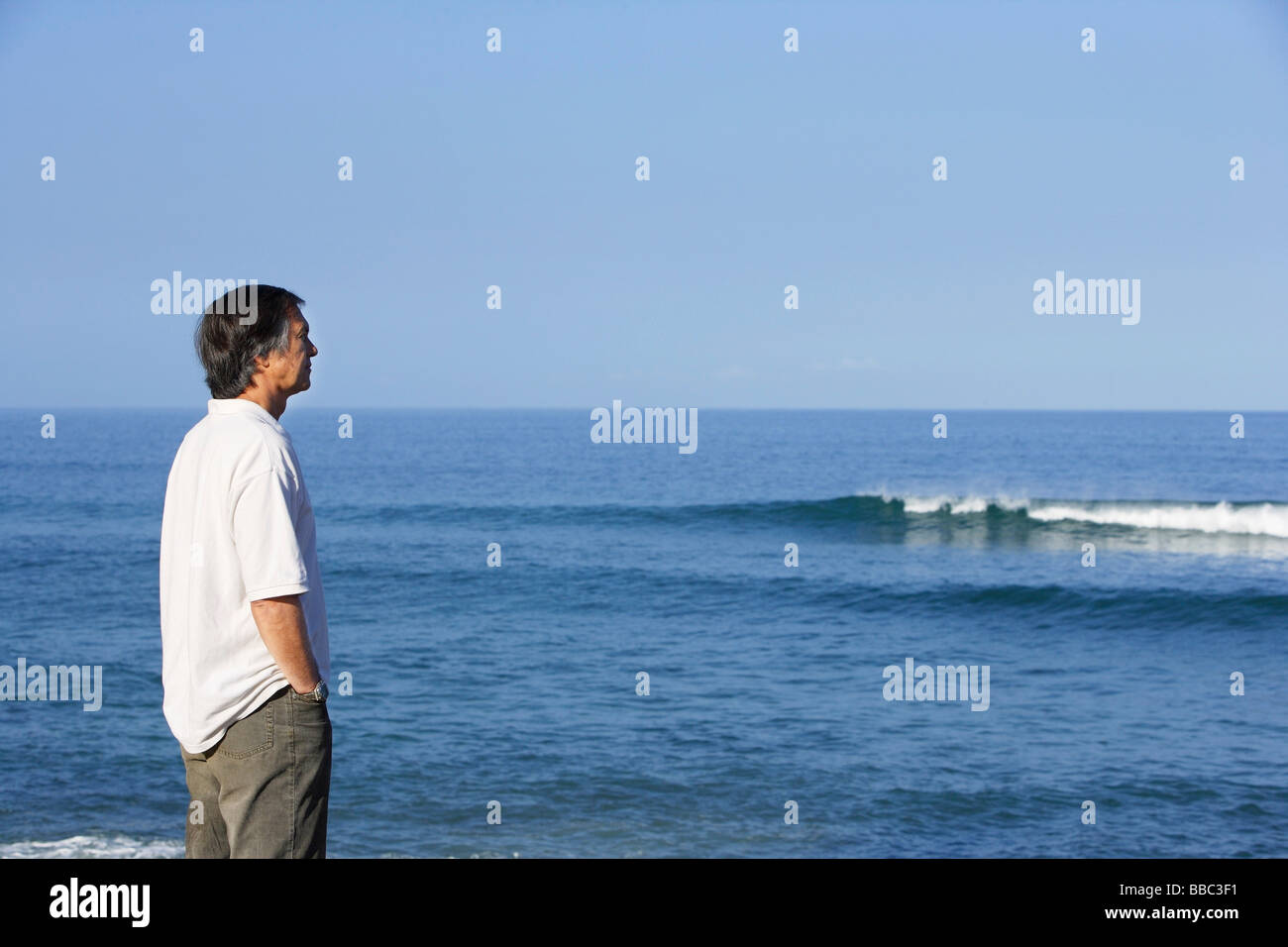 standing on beach Stock Photo - Alamy