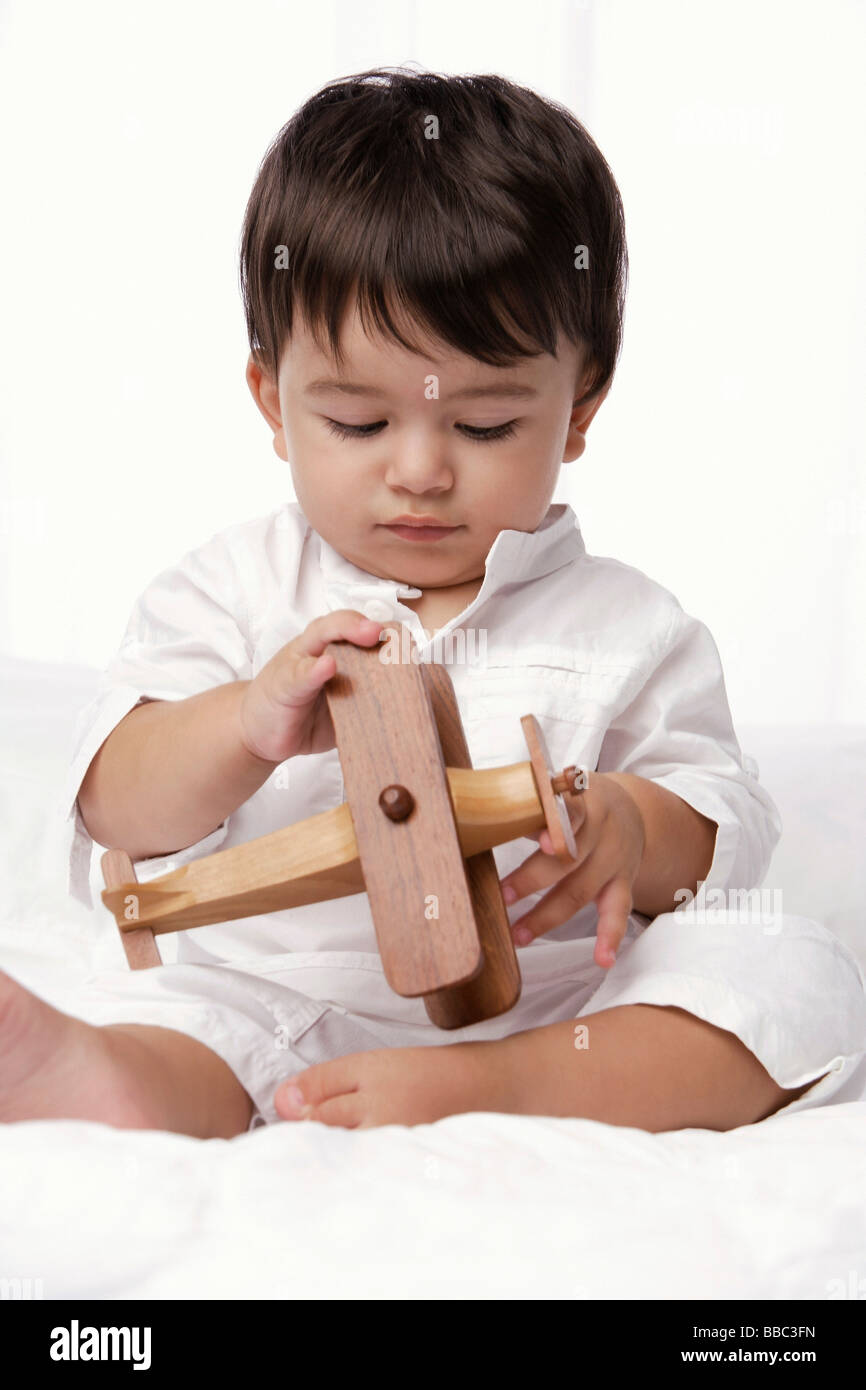 baby boy playing with toy airplane Stock Photo - Alamy