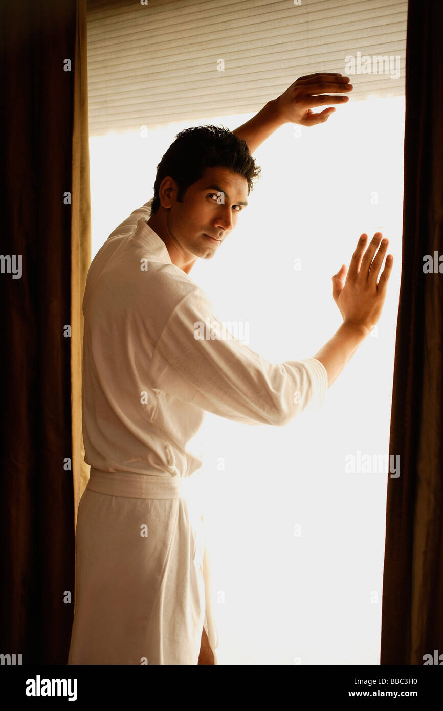 man at window Stock Photo - Alamy