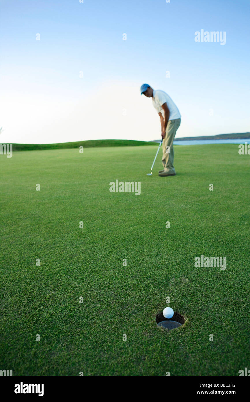 man playing golf Stock Photo - Alamy
