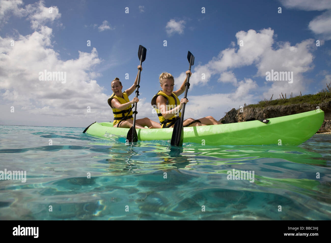 Two Women Kayaking Stock Photo - Alamy