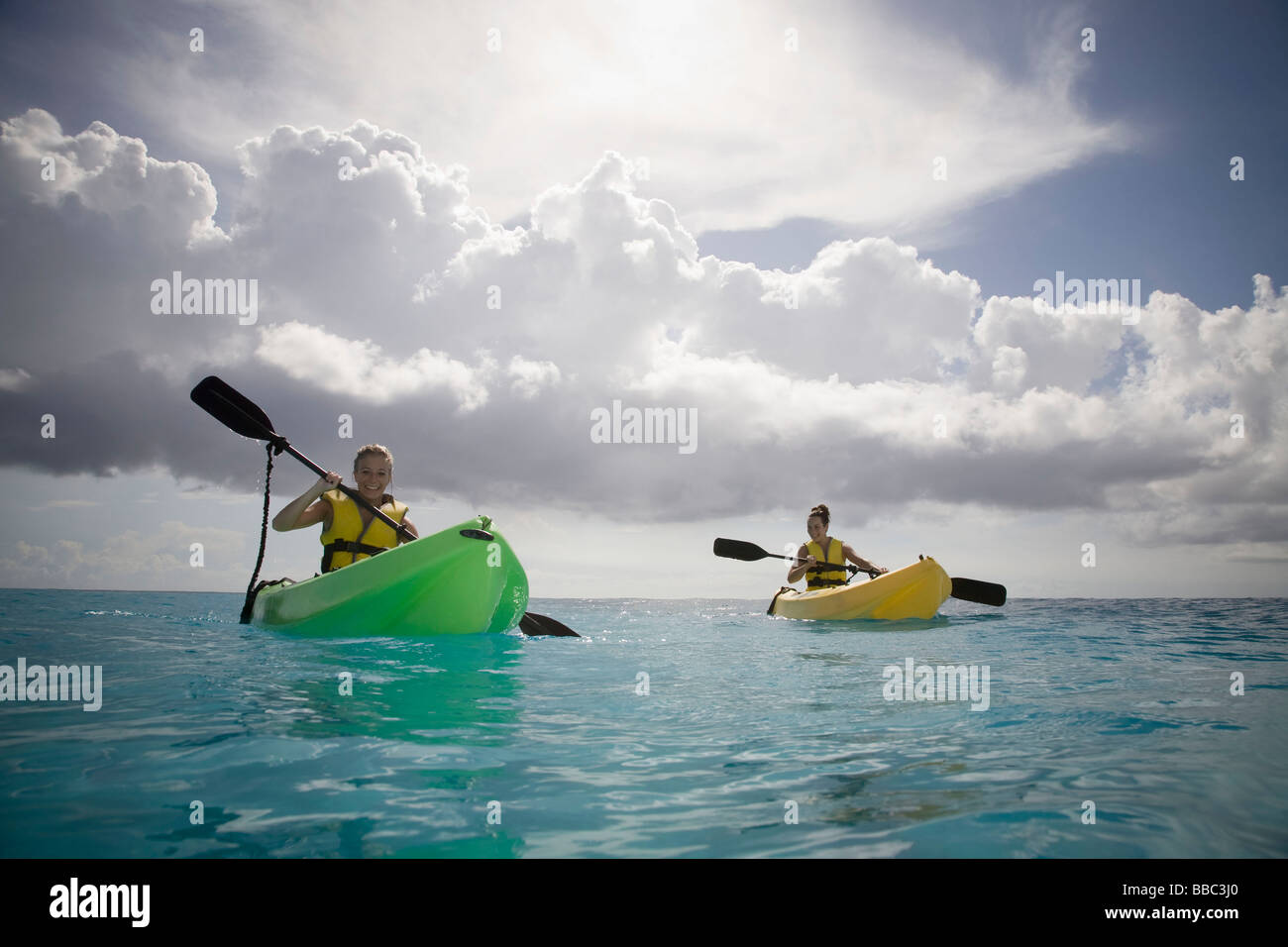 Two Women Kayaking Stock Photo - Alamy