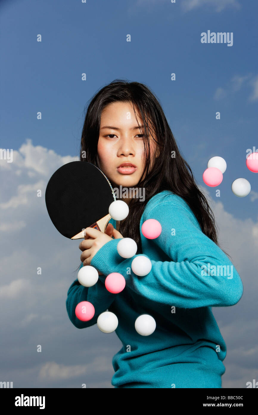 young lady ready to hit ping pong balls Stock Photo - Alamy