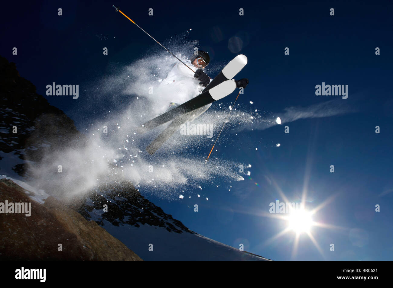 Skier jumping into the air Stock Photo - Alamy