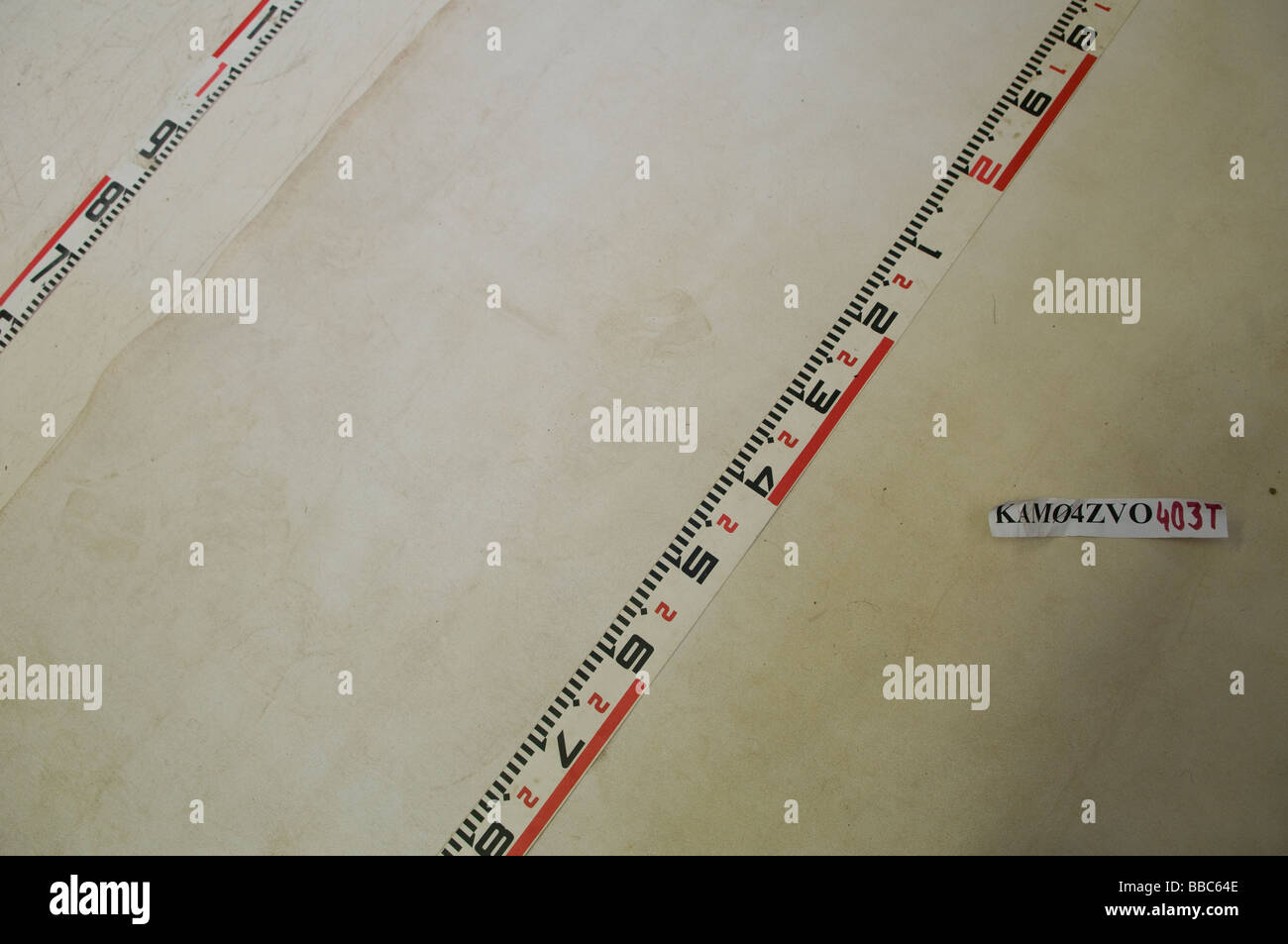Folding rules prepared for measuring remains of body at the mortuary ...