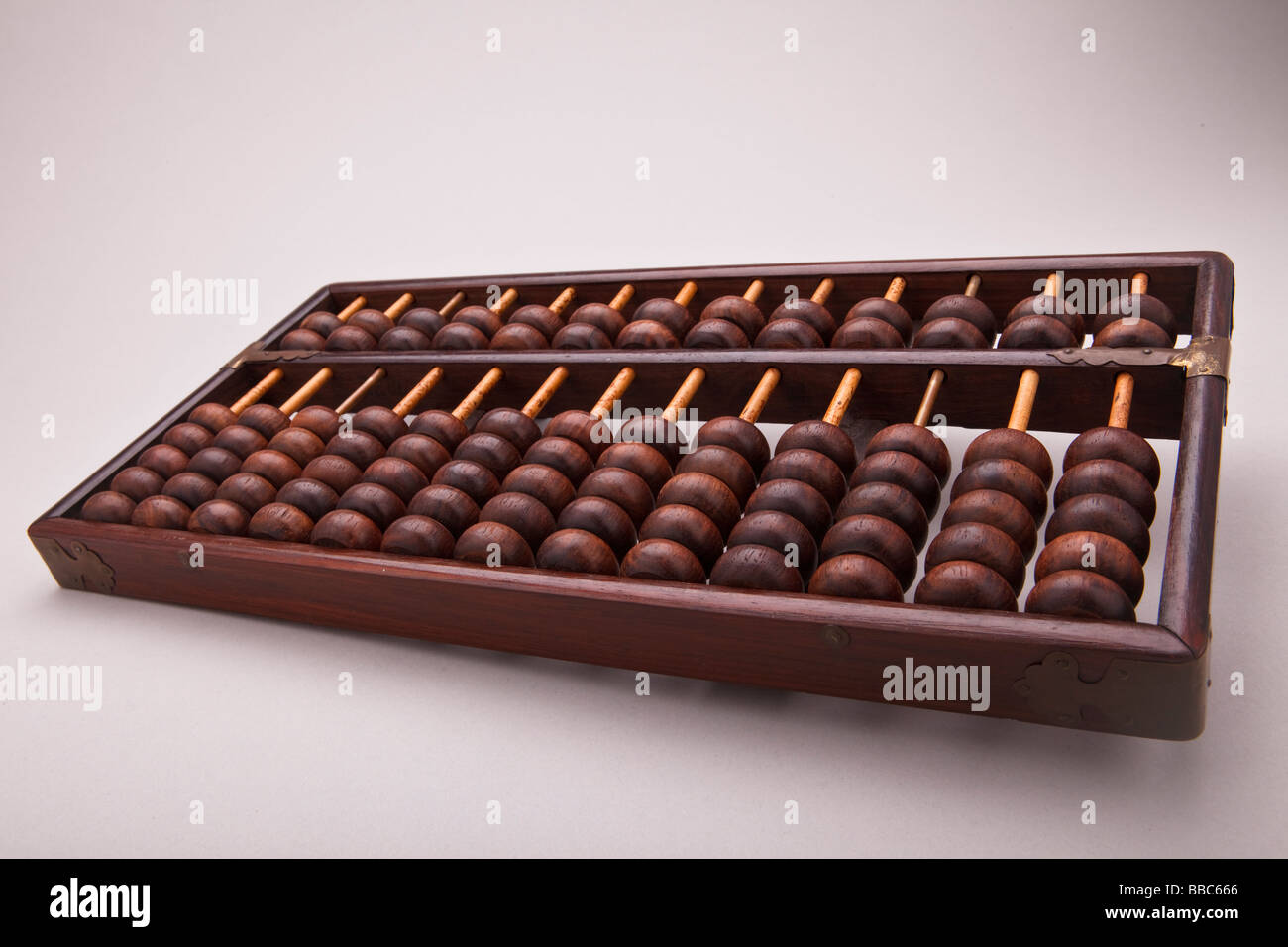 Large Chinese abacus on white background with studio lighting Stock ...