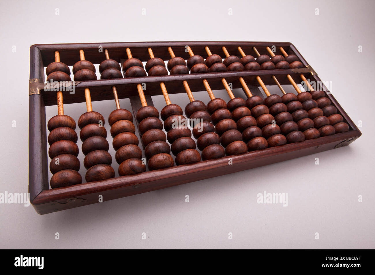 Large Chinese abacus on white background with studio lighting Stock ...