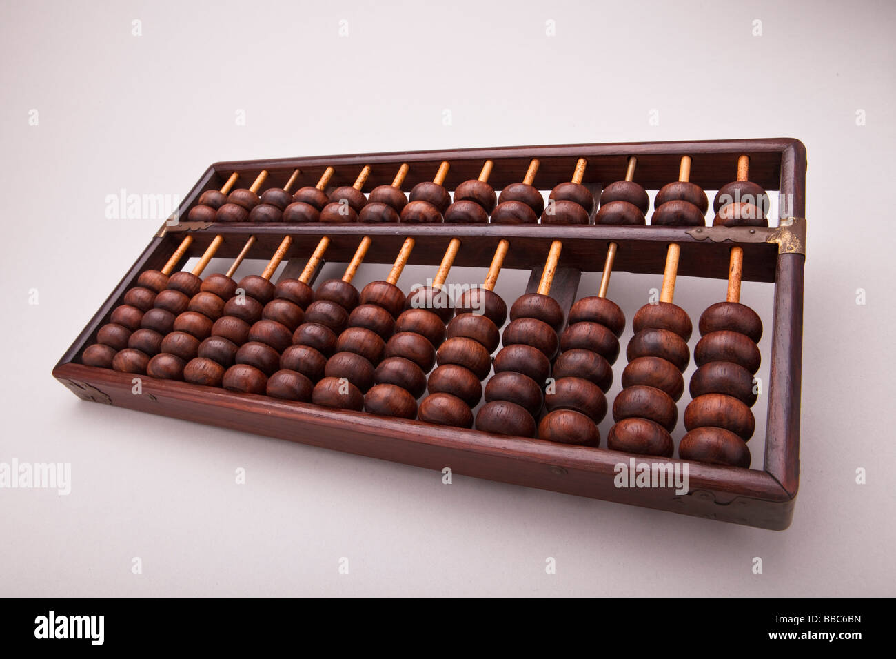 Large Chinese abacus on white background with studio lighting Stock ...