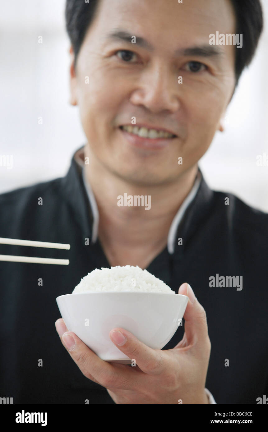 Rice with chopsticks hi-res stock photography and images - Alamy