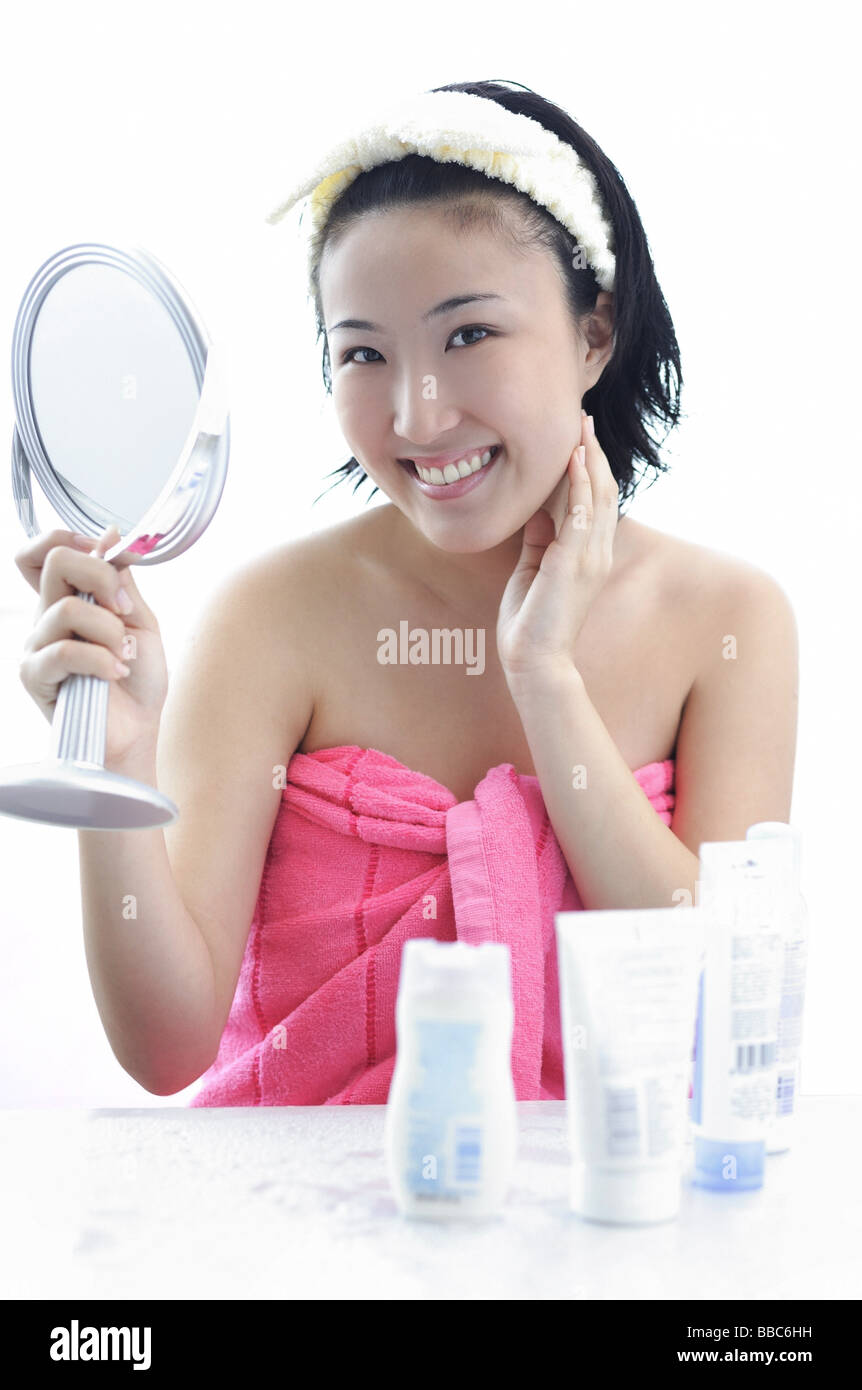 Young Woman Sitting At Dressing Table Cut Out Stock Images And Pictures