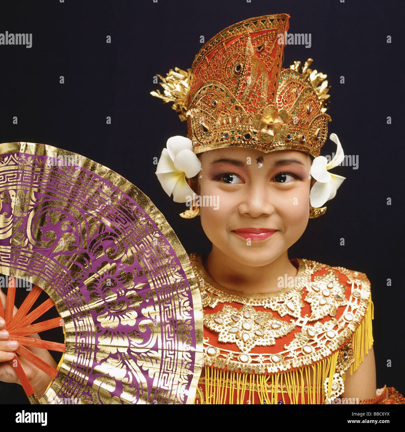 Indonesia, Bali, Ubud, Panji Semirang dancer in full costume holding ...