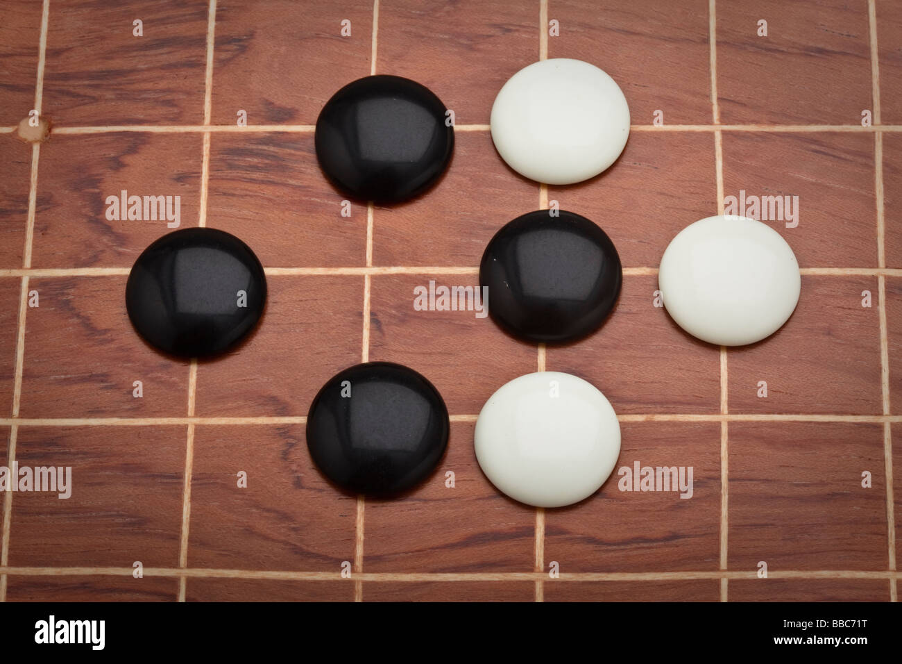 Counters and board for the Chinese board game Go, sometimes referred to ...