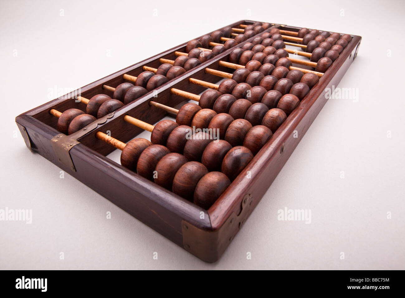 Large Chinese abacus on white background with studio lighting Stock ...