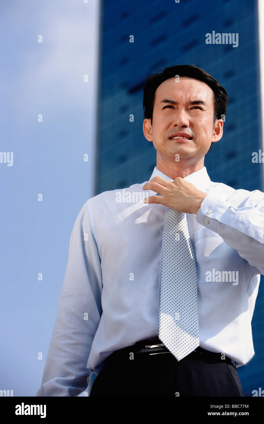 Frowning chinese man hi-res stock photography and images - Alamy