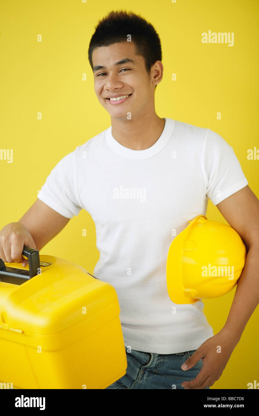 Young construction worker toolbox hi-res stock photography and images ...