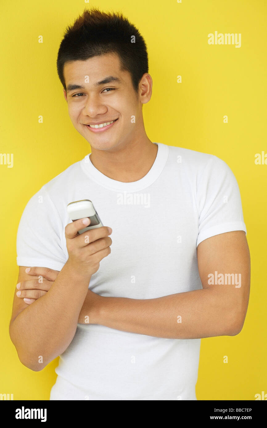 Man holding mobile phone Stock Photo - Alamy